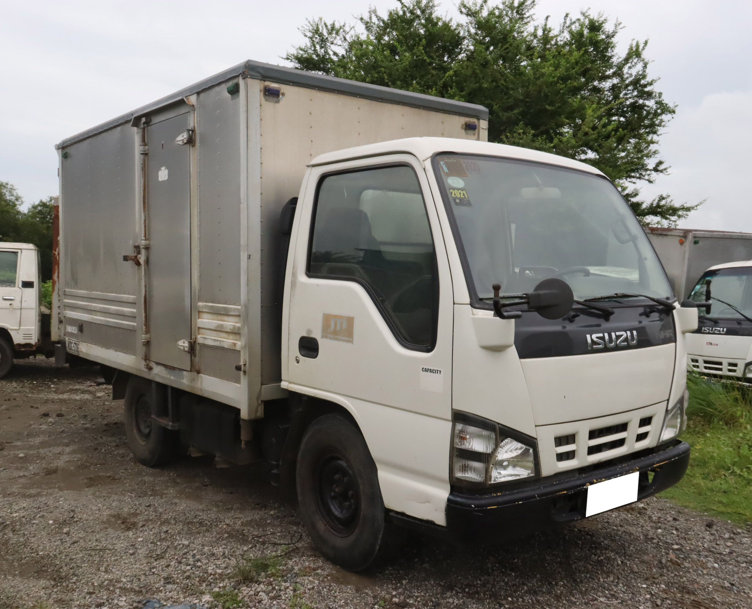 2017 Isuzu NHR 4X2 4W Aluminum Van | 1 Unit — Lot 12 | HMR Shop N' Bid